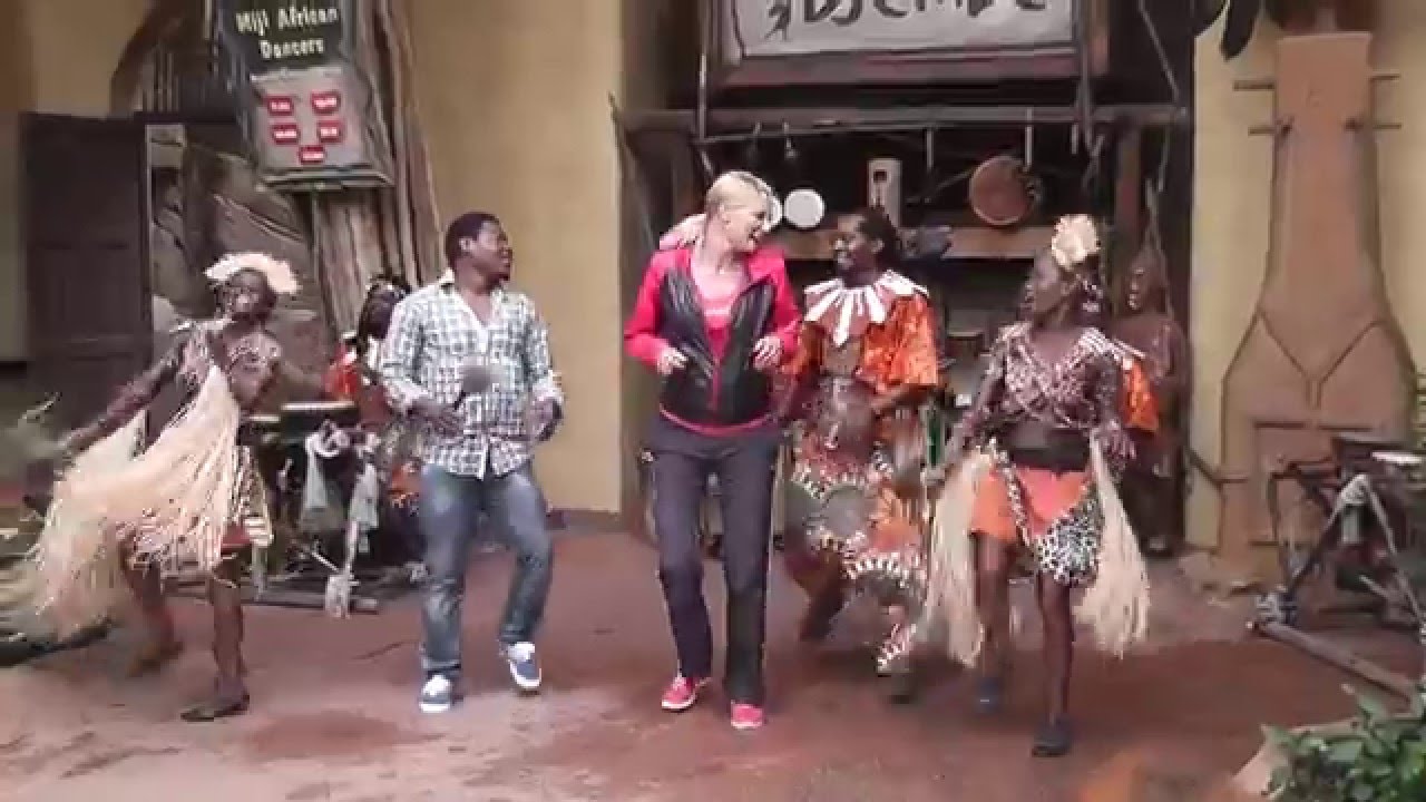Blonde woman dancing with Djembe band in Phantasialand - YouTube