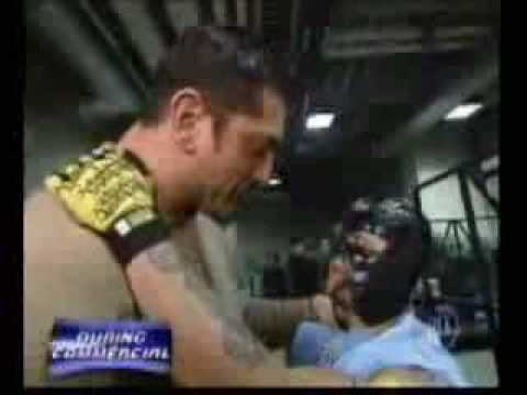Batista And Rey Mysterio Hug