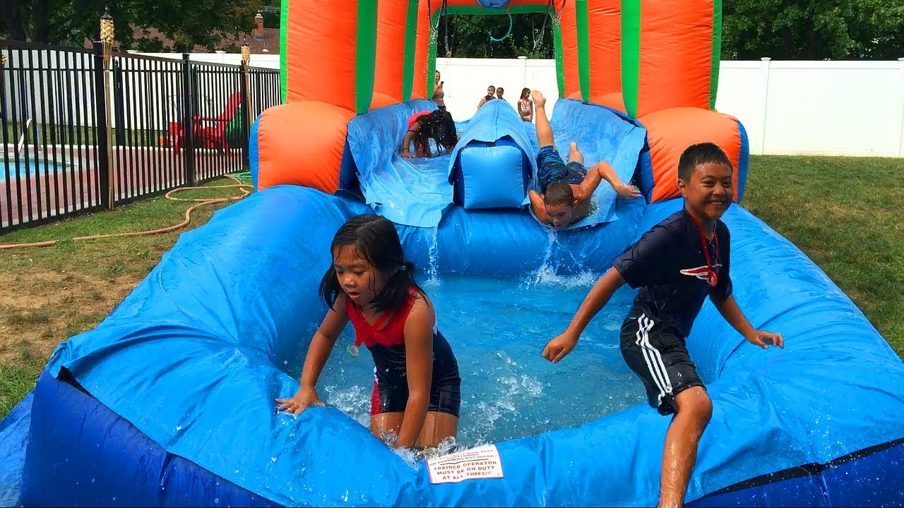 Screaming Kids Race Slip And Slide Challenge Boys Vs Girls Who is ...