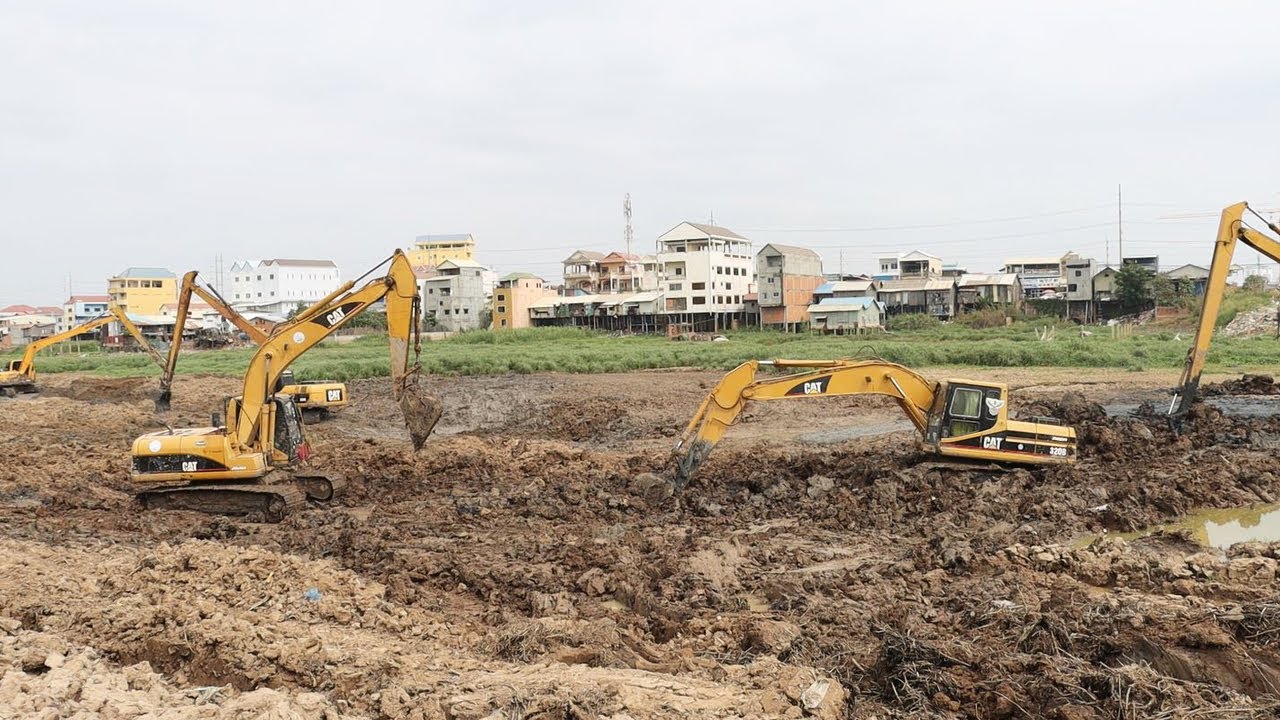 Good Job Heavy Machine Build New Road Over The Lake - Bulldozer Pushing ...