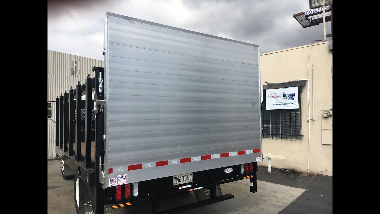 Tommy Gate Rail Lift installed by Mac's Lift Gate on Isuzu Stake - YouTube
