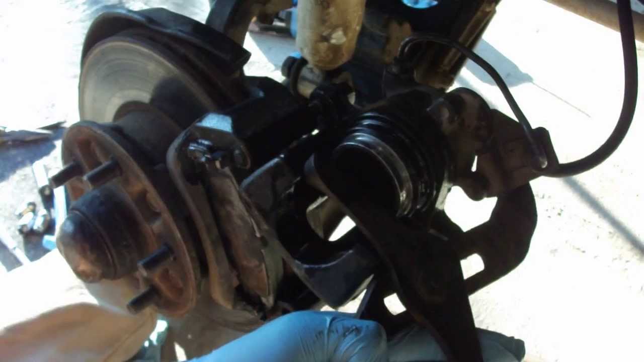 caliper piston dust boot trick - YouTube