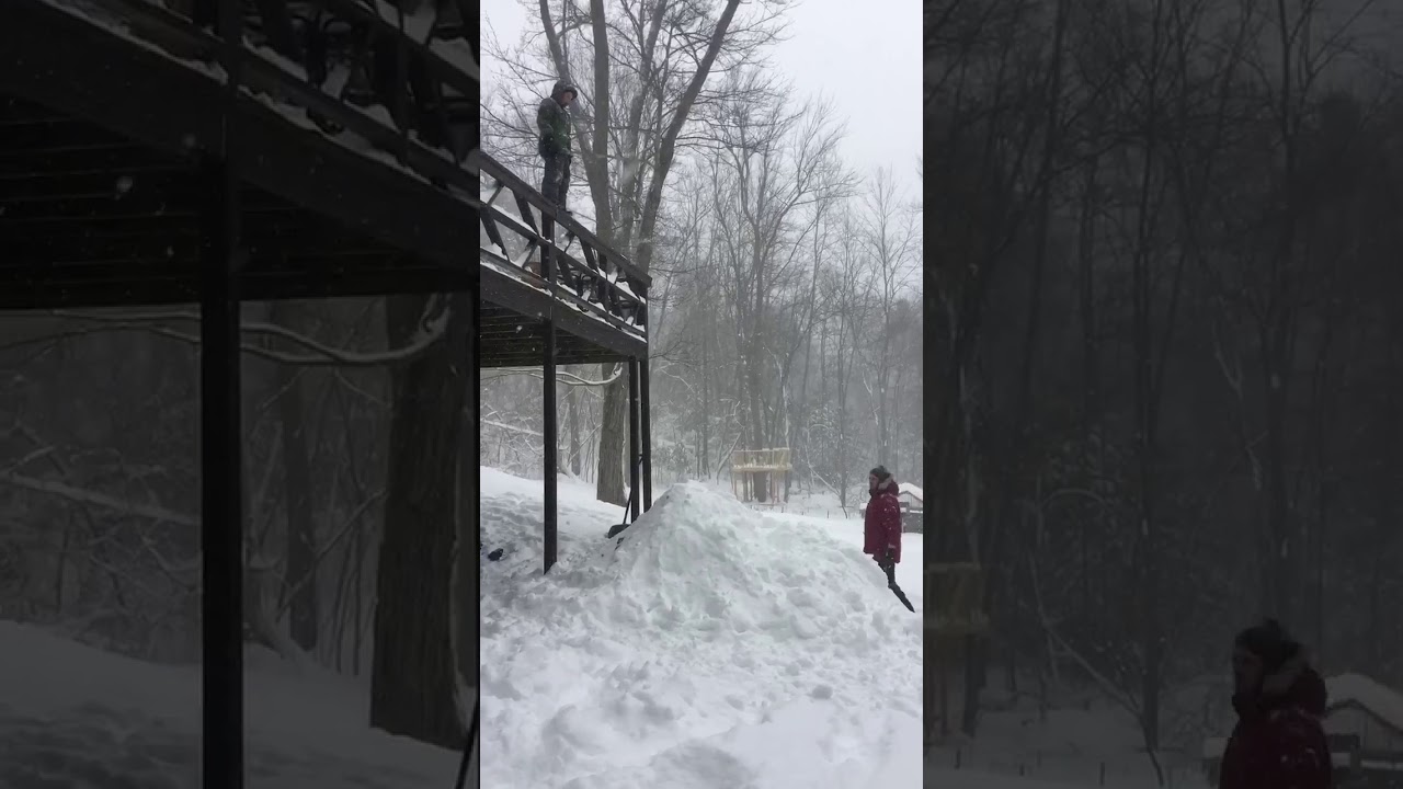 Ayden landing head first in snow pile from 2nd floor deck - YouTube