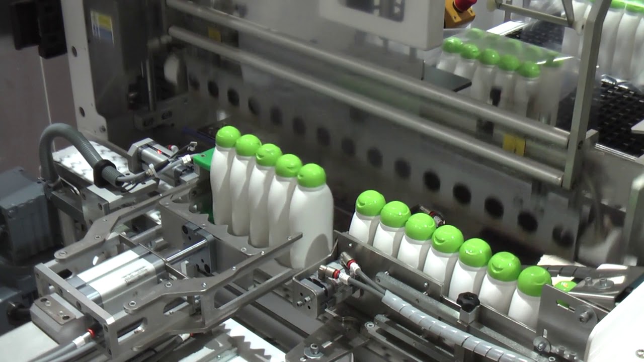 Video of Automatic Sleeve Wrapper Wrapping Plastic Bottles by ME ...