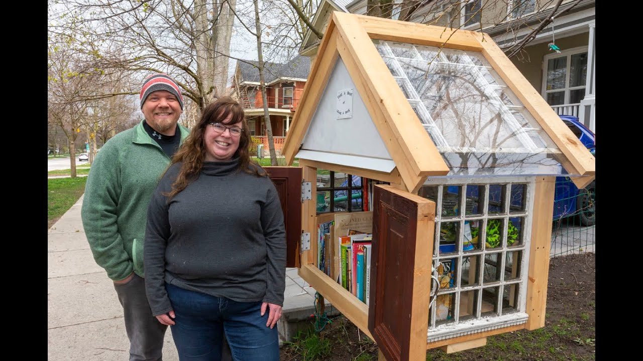 Librarian shares books in custom built library - YouTube