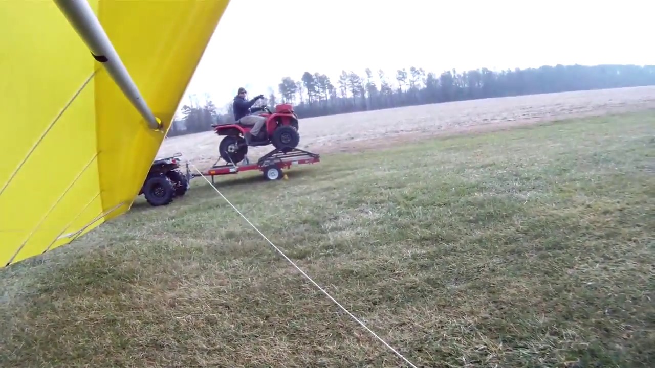 Launching a Falcon 2 hangglider on a quad tow - YouTube