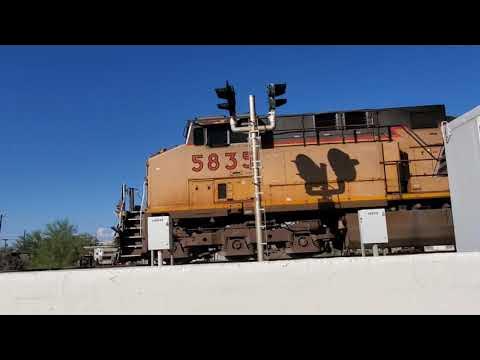 Union Pacific 5835 passes McQueen Road slowly carrying CSX Locomotive 7259 - YouTube