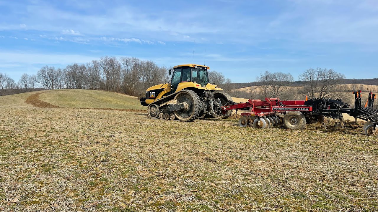 Ripping up dirt with a Cat Challenger 55 - YouTube
