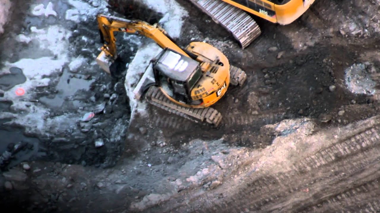 Cat 308DCR Excavator digging out of a footing - YouTube