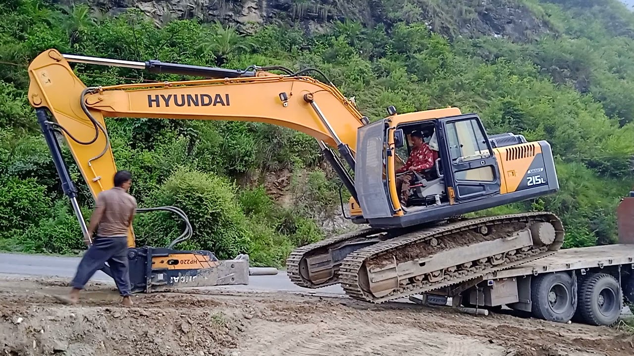 Poclain machine loading on trailer || Hyundai Poclain Machine || how to ...