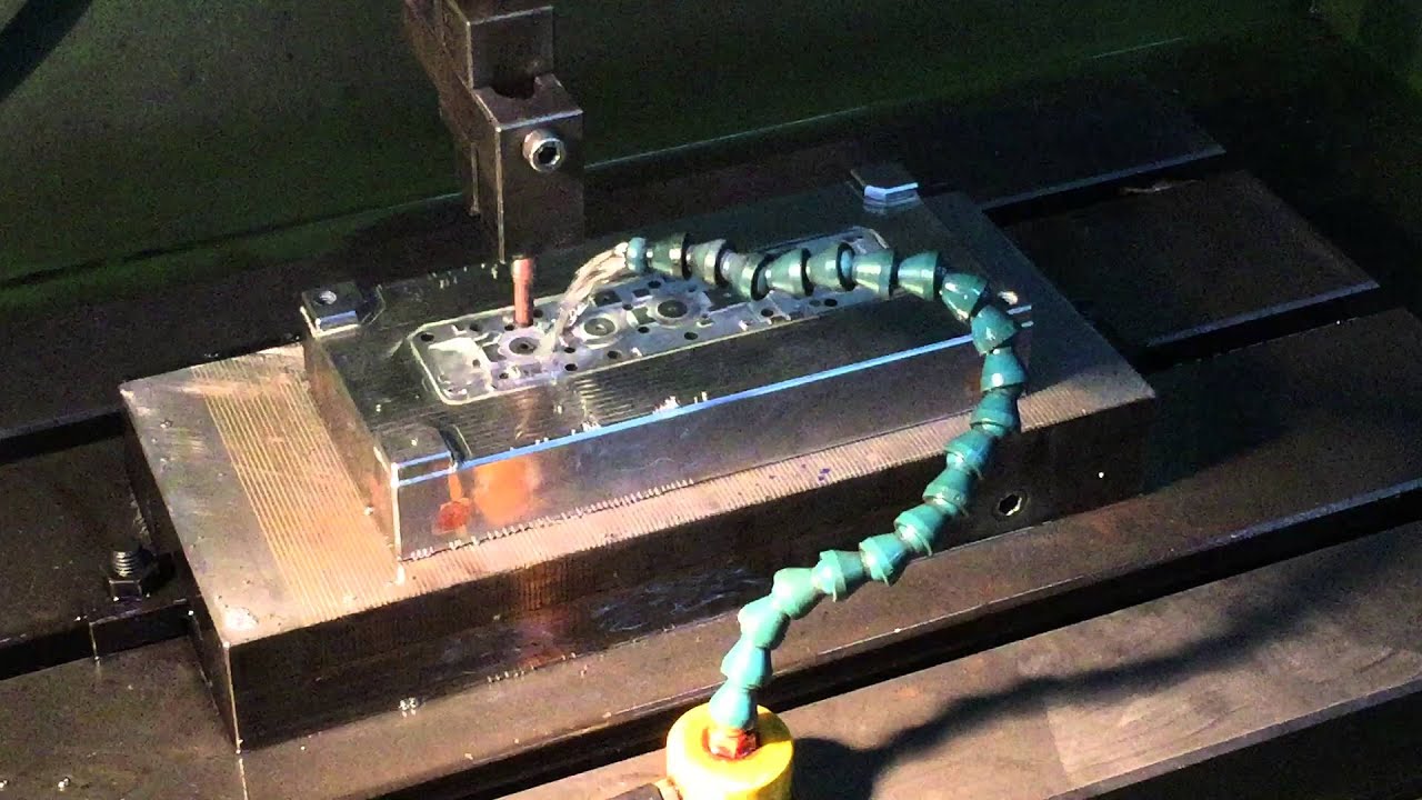 Plastic Injection tooling being produced with sinker EDM process - YouTube