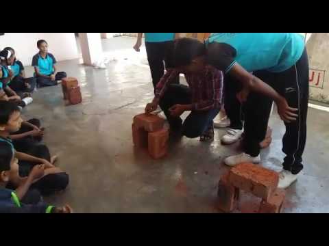How to break a brick very easy method - YouTube