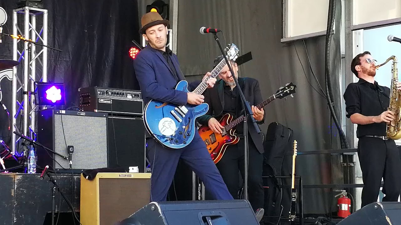 Ben Racine and his band, playing the guitar he won at the IBC a few ...