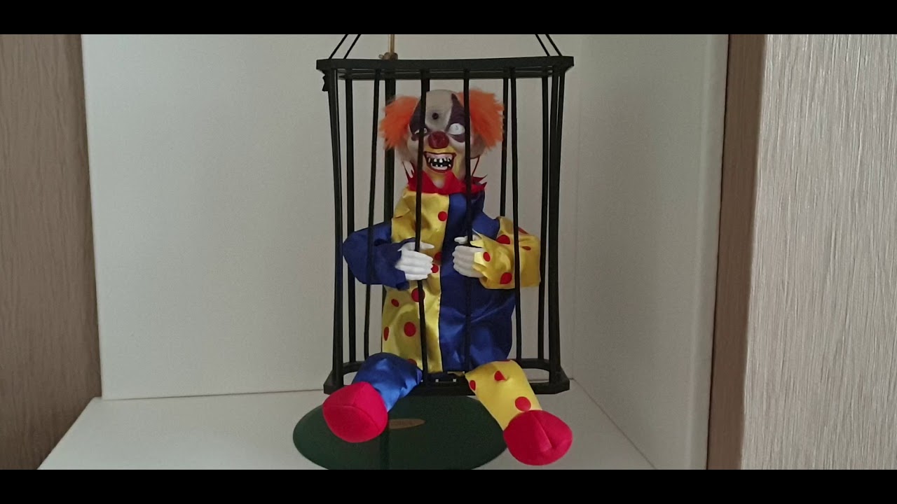 Clown in cage - YouTube