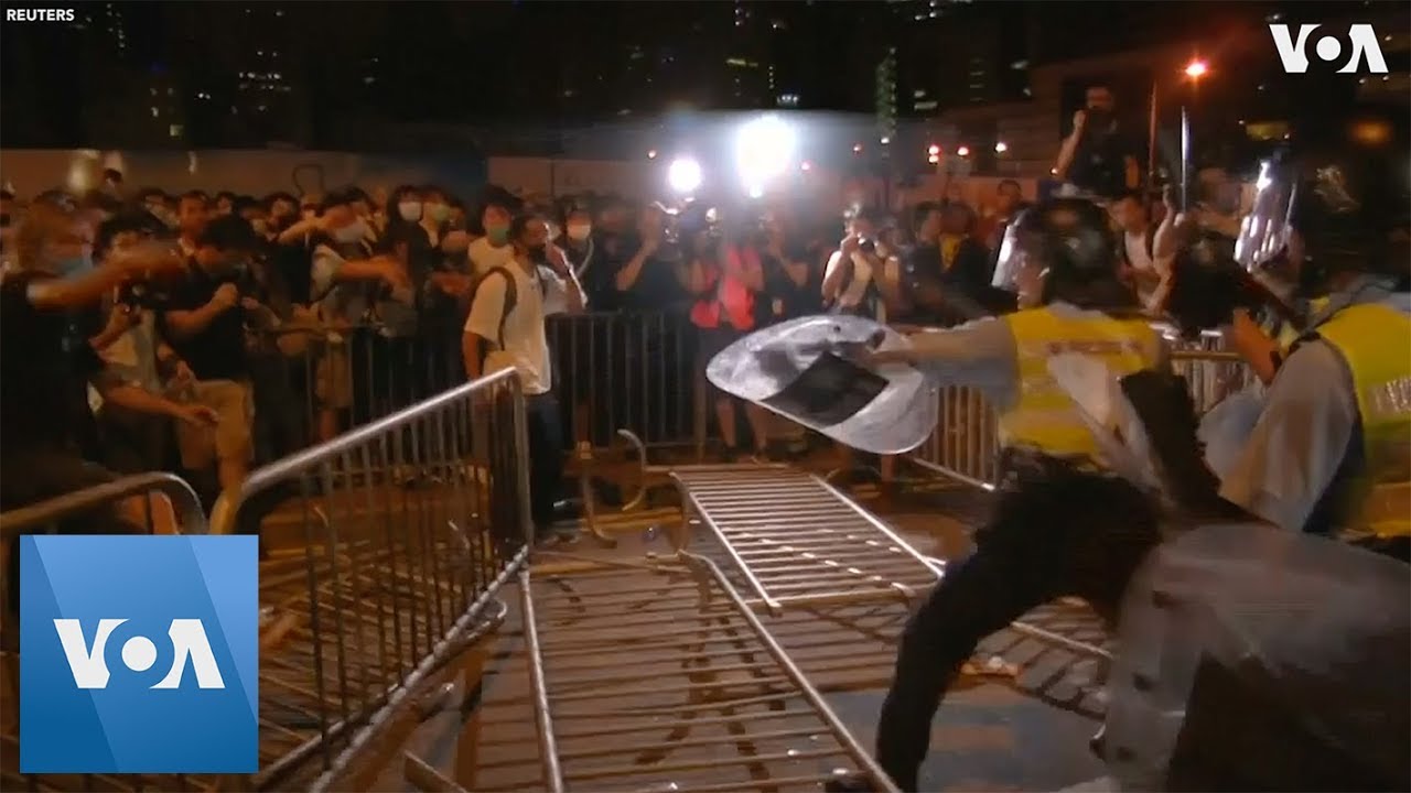 Riot Police Clash With Protesters in Hong Kong - YouTube