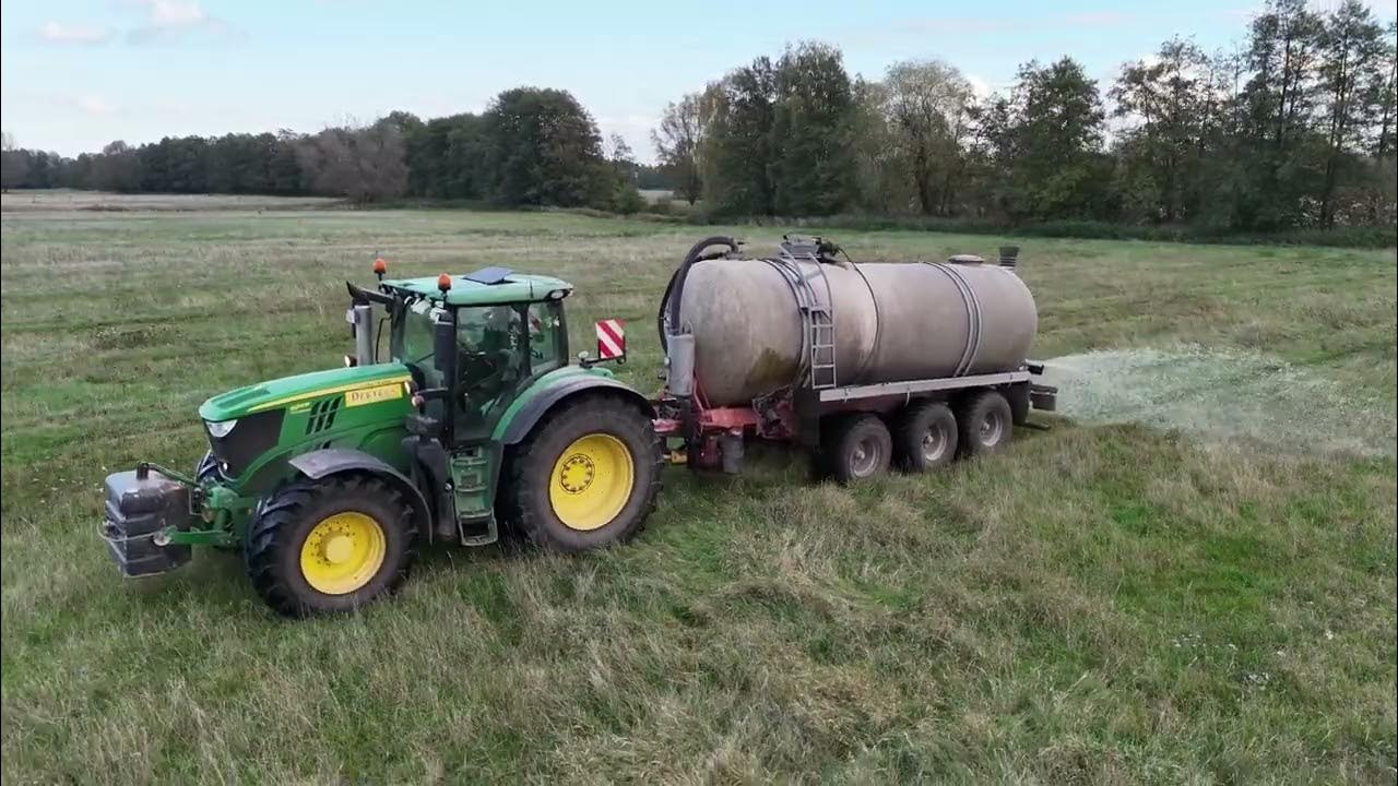 JOHN DEERE 6215 R mit ANNABURGER HTS 29.27 GÜLLEFASS am Wasser Ausbringen - YouTube