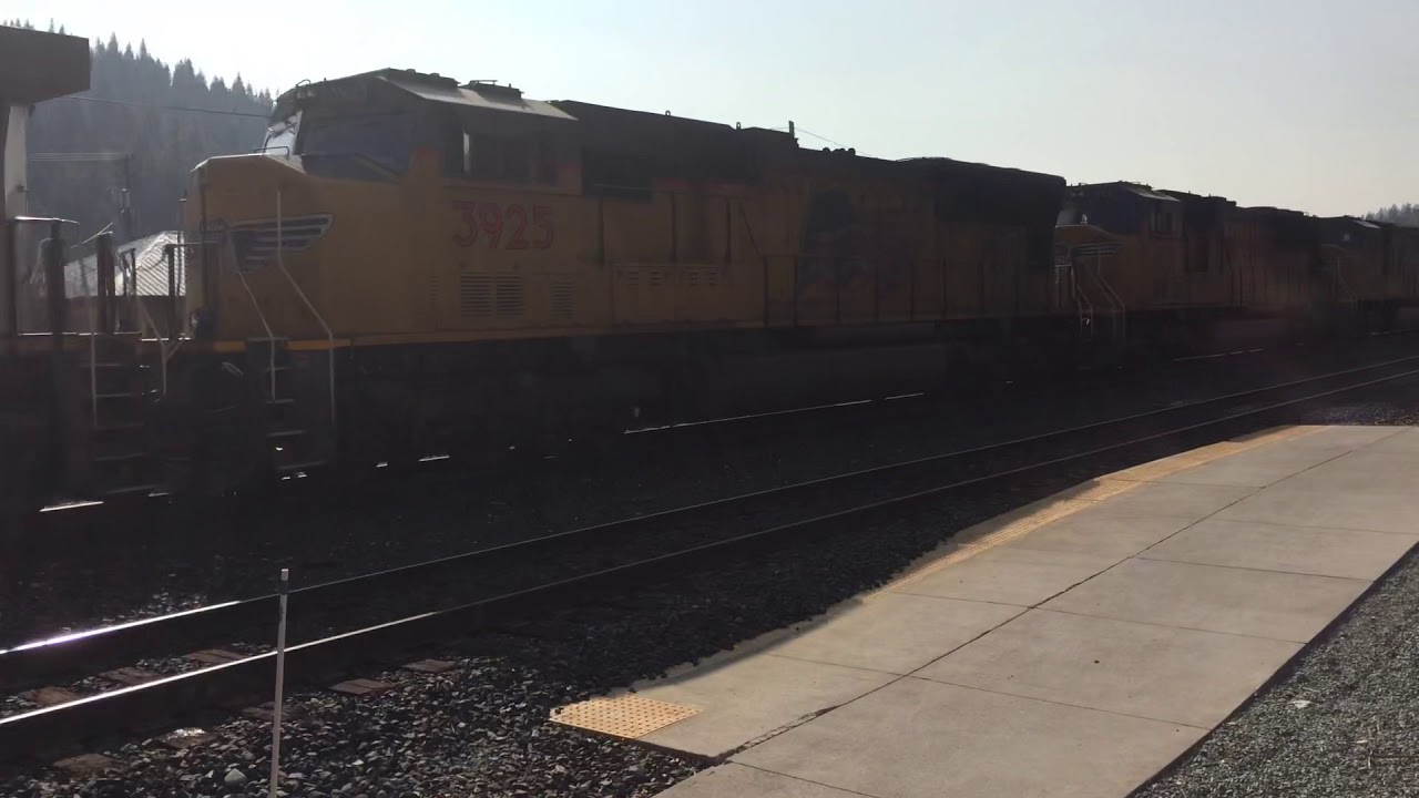 Long double decker freight train rolling through Truckee station - YouTube