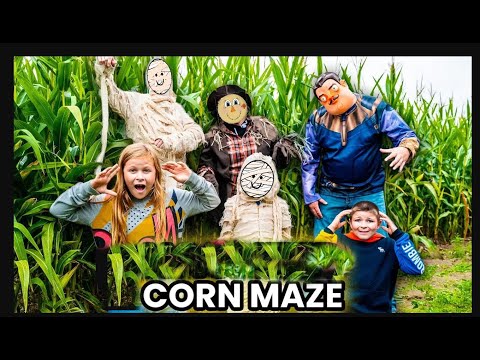 Assistant and Ryan Search Solve Puzzles In The Fall Corn Maze