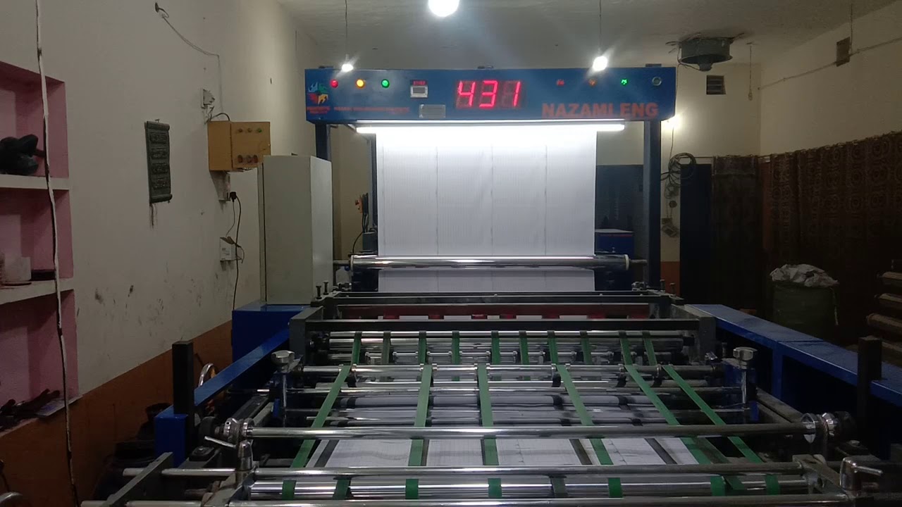 Pakmatic note book rulling machine made by nazami engineering works ...