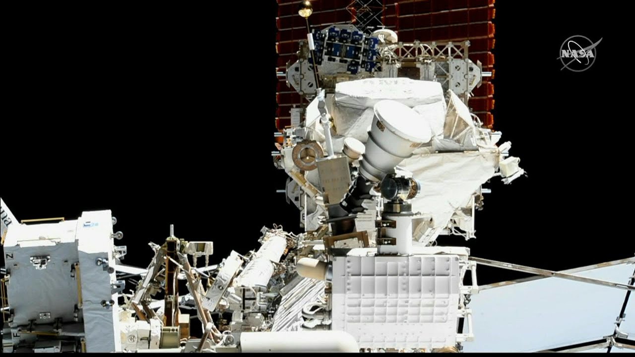 ISS astronauts conduct spacewalk for repairs | AFP - YouTube