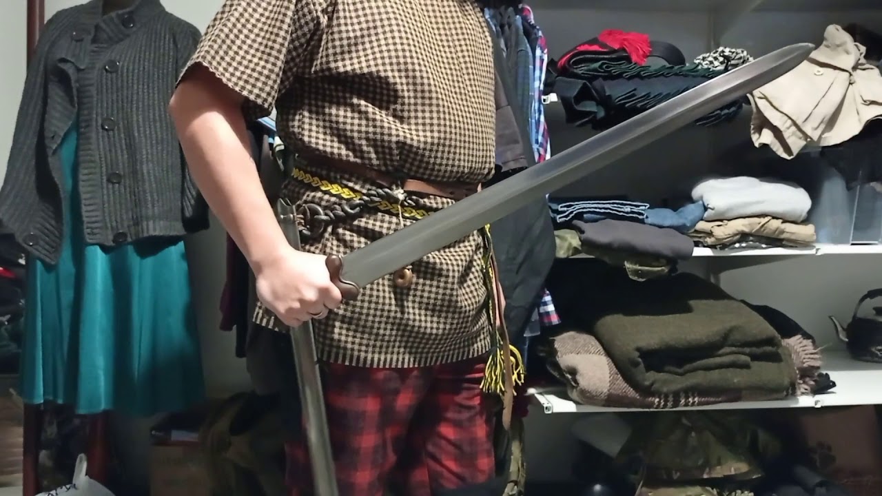 Sword attachment system with armored belt. - YouTube