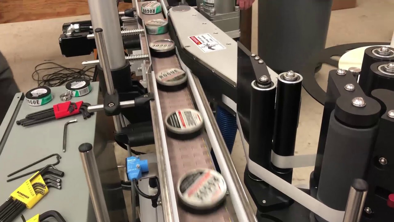 Wrap Labeling System for Long Skinny Labels for Bottom of Round ...