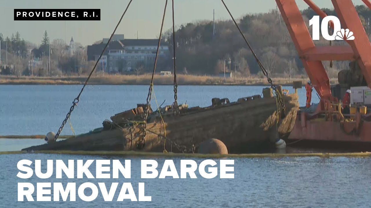 Crews work to pull out sunken barge out of Providence River - YouTube
