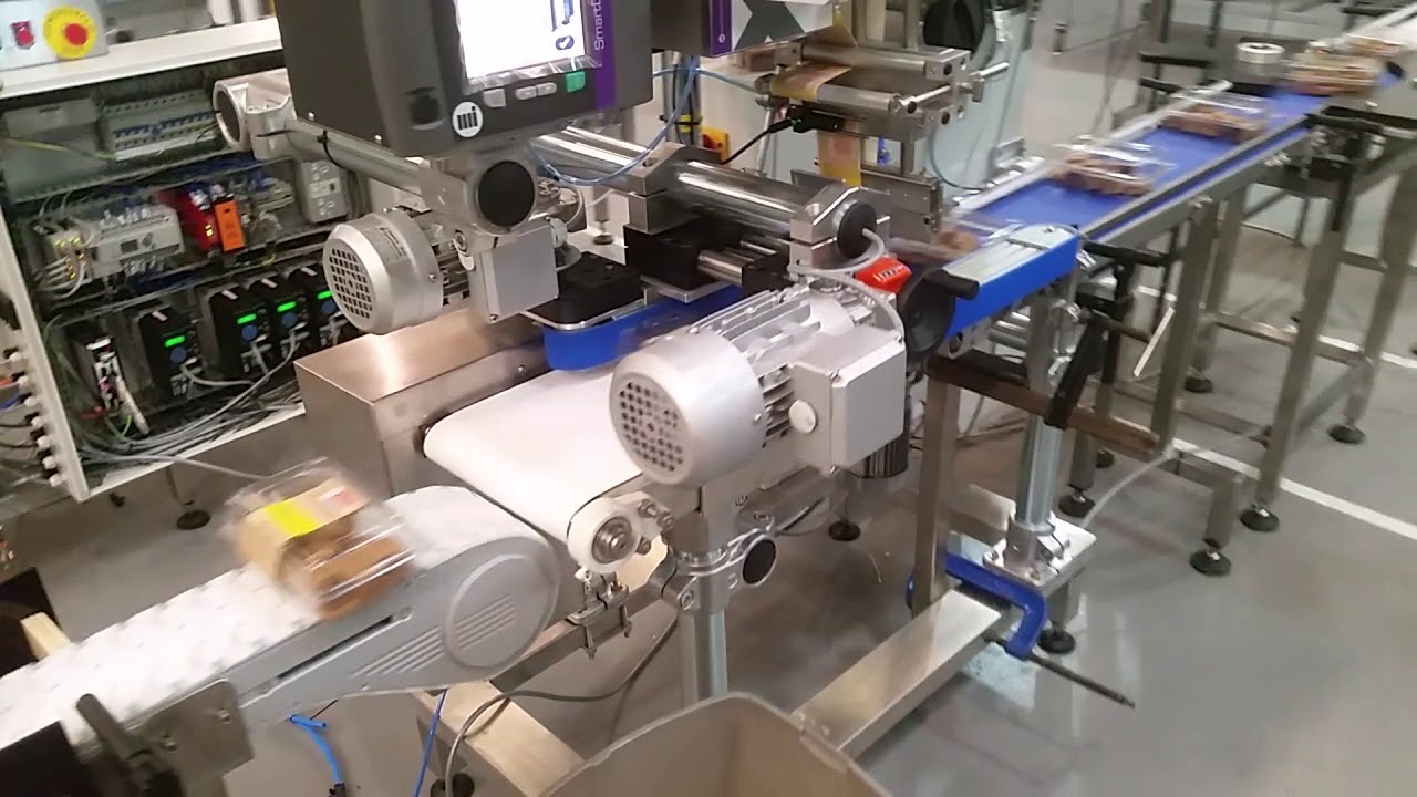 C Wrap Labelling of Bakery trays @ 90 per minute - YouTube