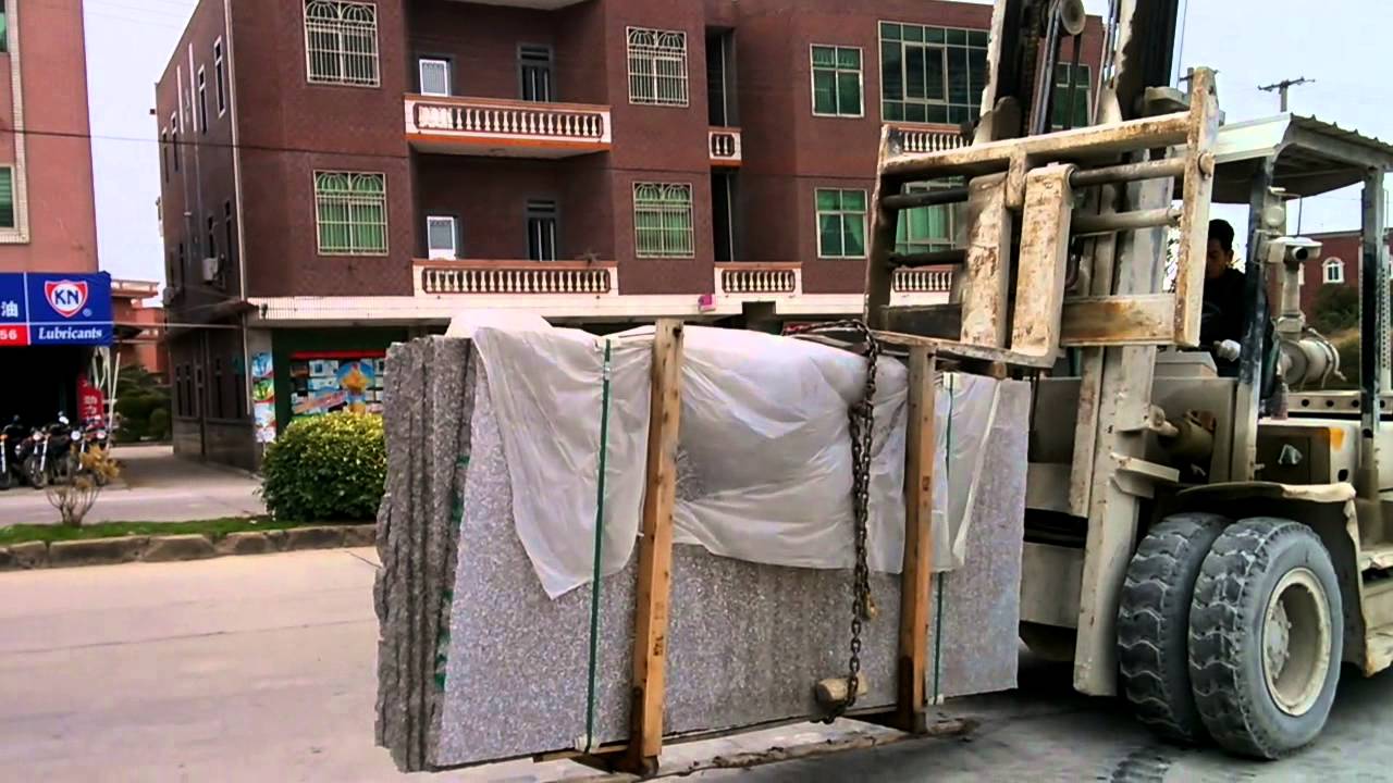 Loading G664 granite slabs to container - GB UNITED - part 1 - YouTube