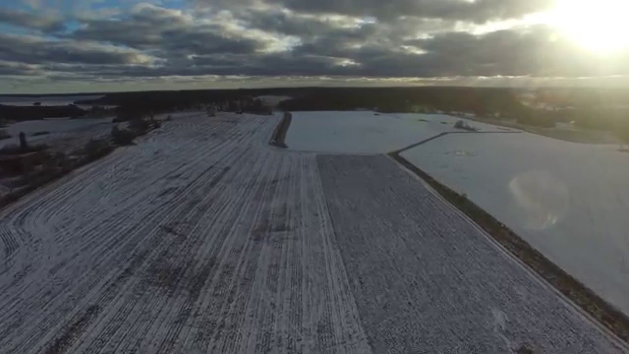 DJI Phantom 3 Professional Drone glidning over snowfield - 4K - YouTube