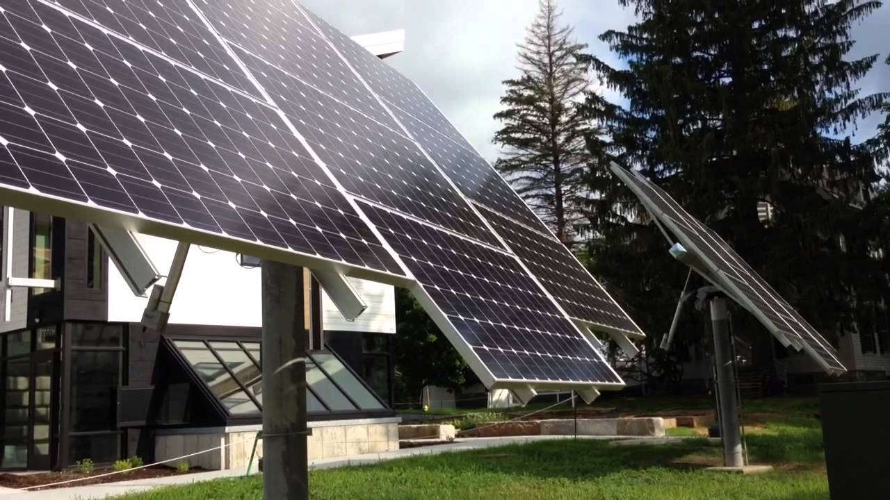 Solar panels tracking the sun. - YouTube