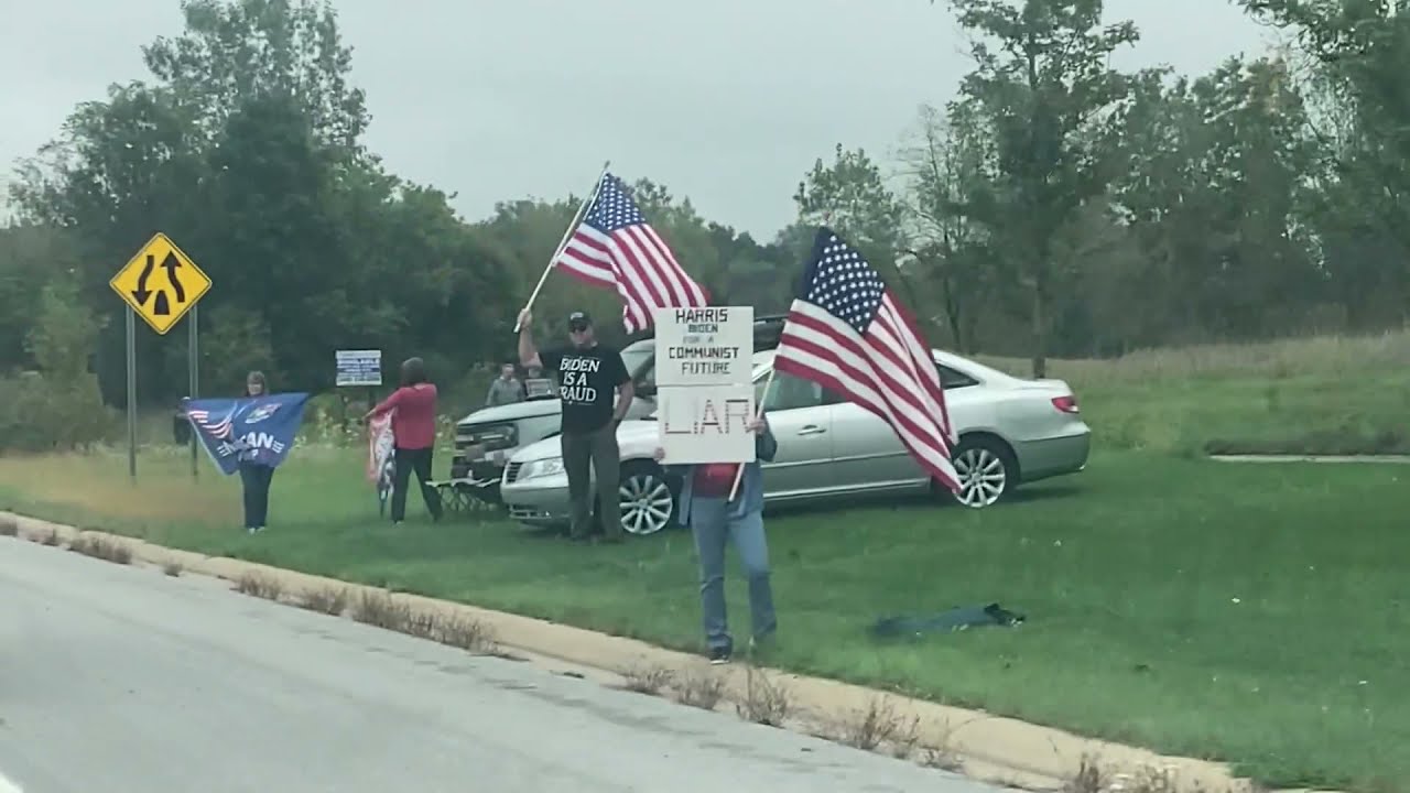 Protestors line streets in advance of President Biden visit to Howell ...