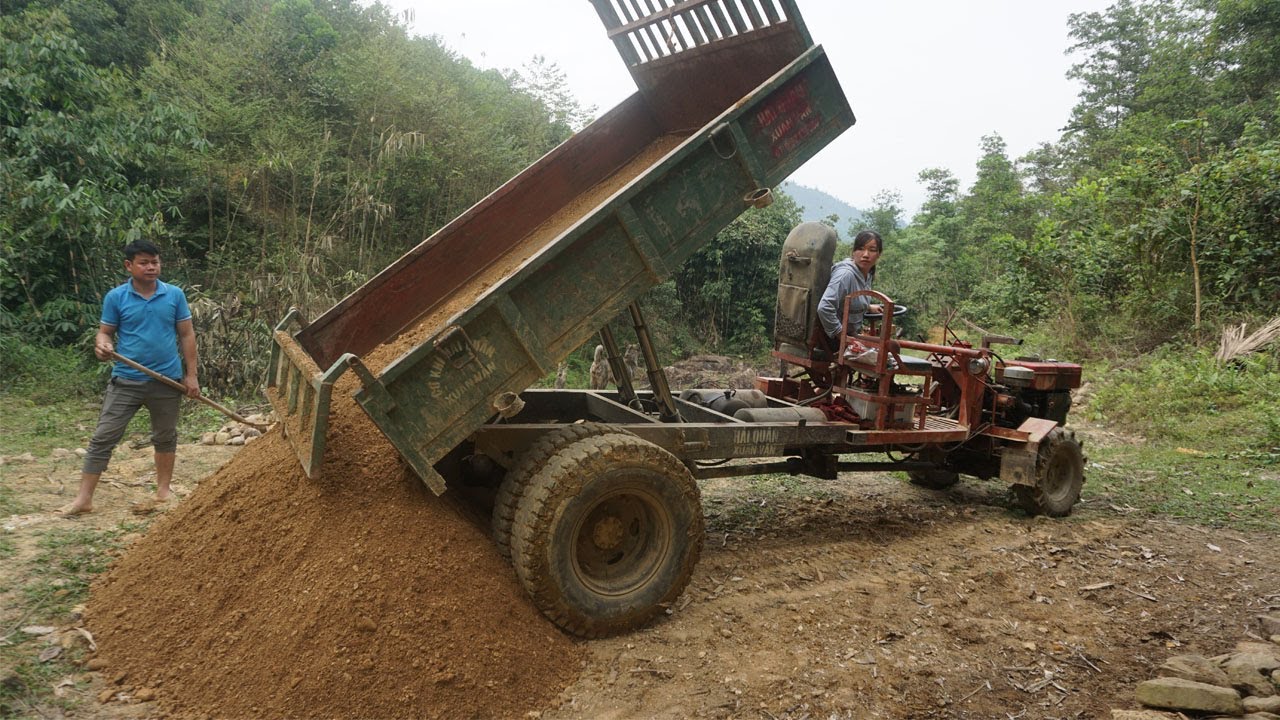 Agricultural vehicle transporting sand alone / Girls can drive farm ...