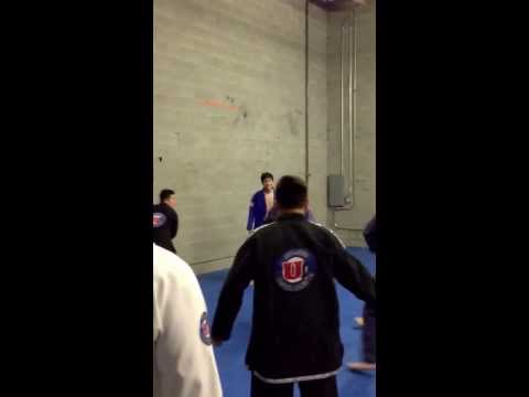 Emil Van Hove getting his blue belt at www.theagorabjj.com