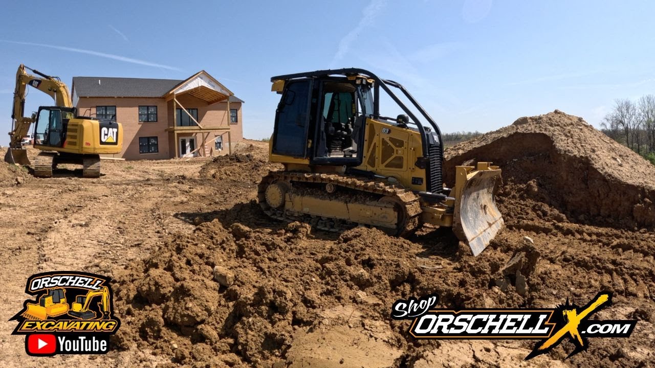 Building a Pad for a Pole Barn using the Cat Dozer and Excavator. - YouTube