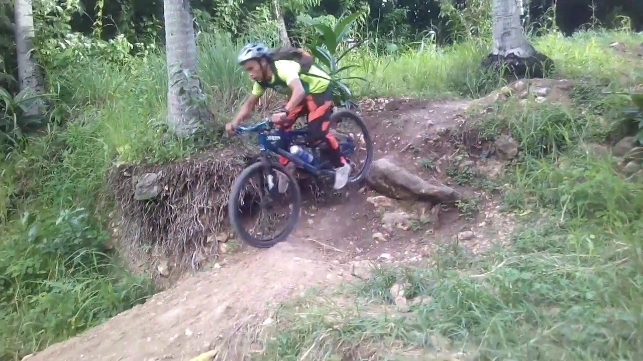 How to tackle (literally) a drop off on a Mountain Bike - YouTube