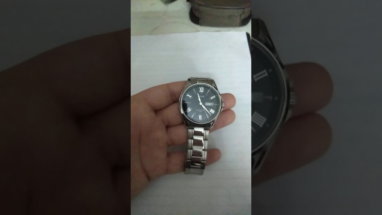 Casio MTP-1384 day date watch black dial stainless steel - YouTube