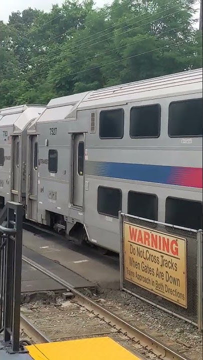 NJT Multilevel #7022 with a Improper railroad crossing sequence at Hazlet - YouTube