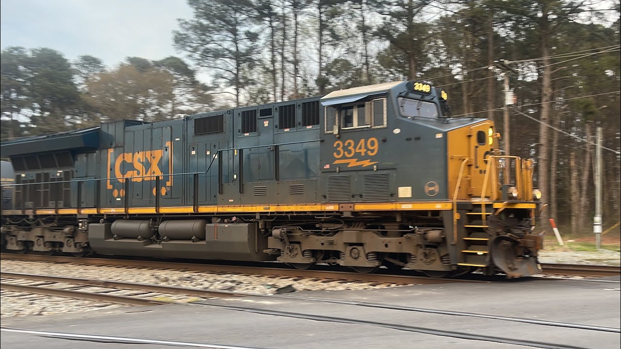 CSXT M409.21 ET44AH 3349 with nice K5HL on the horn show ES44AH 833 as DPU beating to build ...