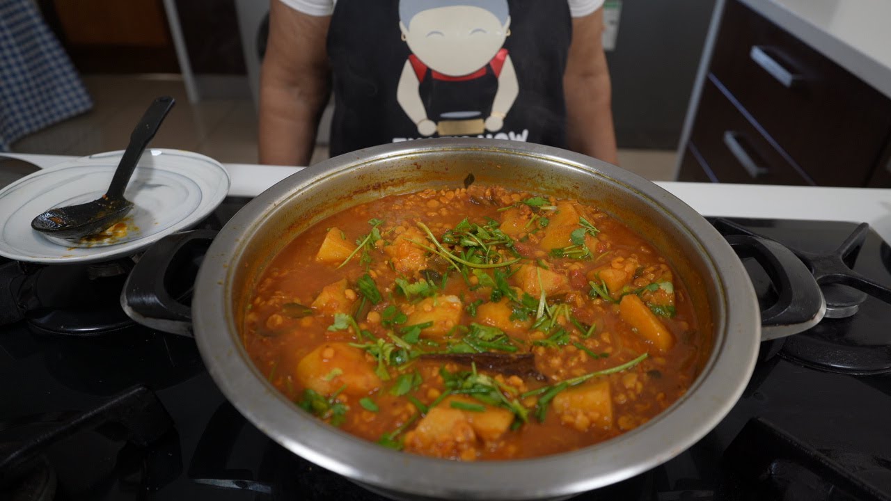 Making dhal curry and spicy savoury puri: Part 1 the dhal curry - YouTube