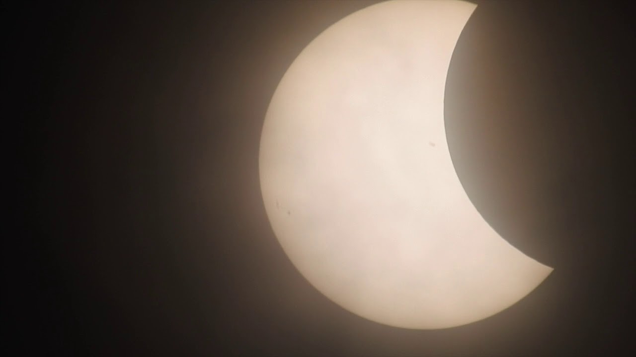 WATCH: The solar eclipse begins it's journey in the Miami Valley - YouTube
