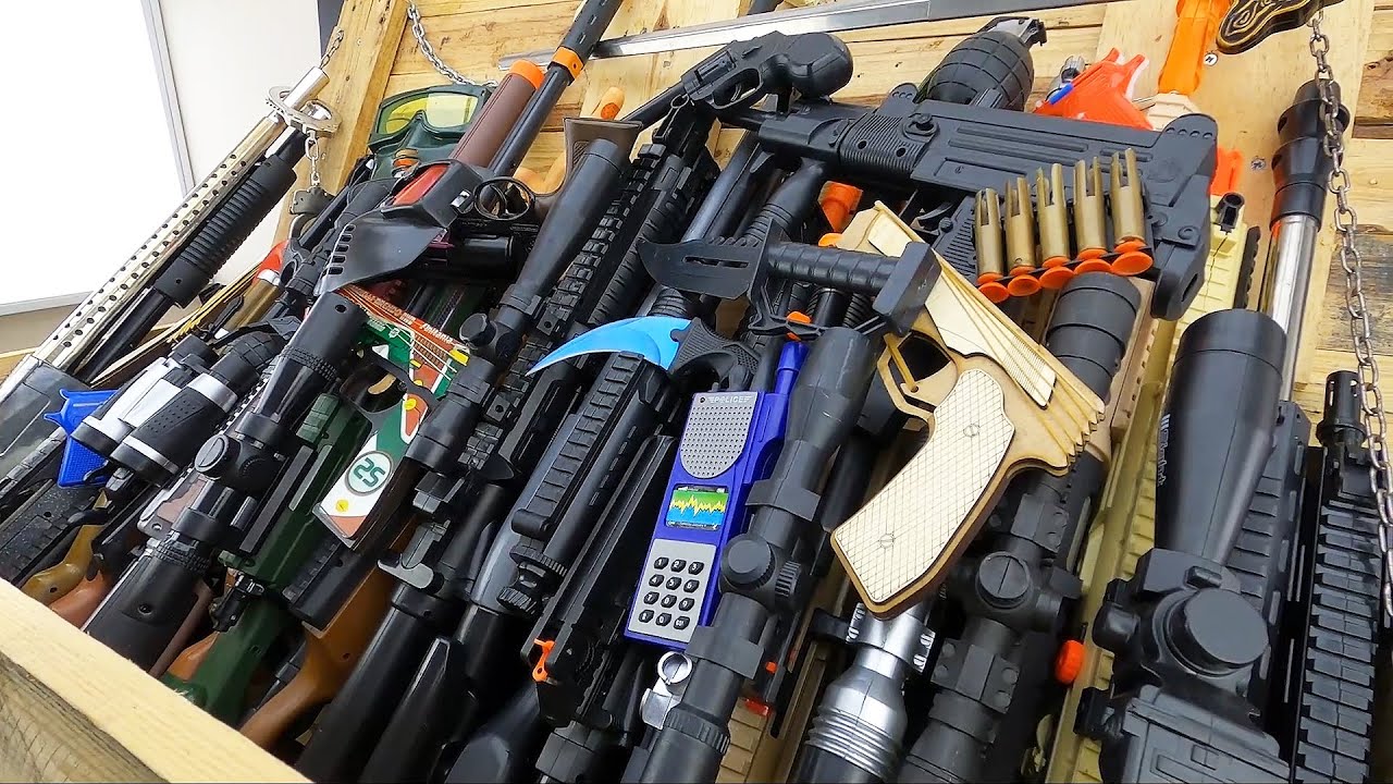 A Huge Crate Of Heavy Machine Guns, Sniper Guns, All The Toy Guns Ready ...