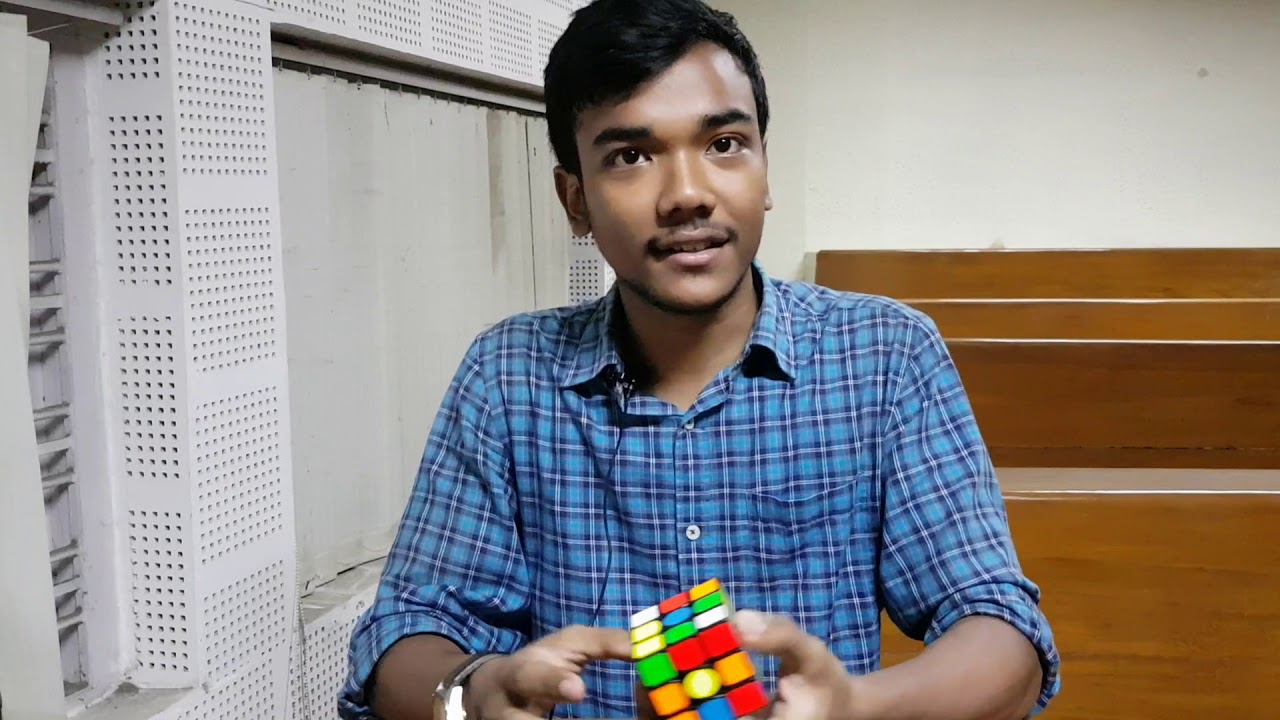 This chess player is the reigning Rubik's cube world champion! - YouTube