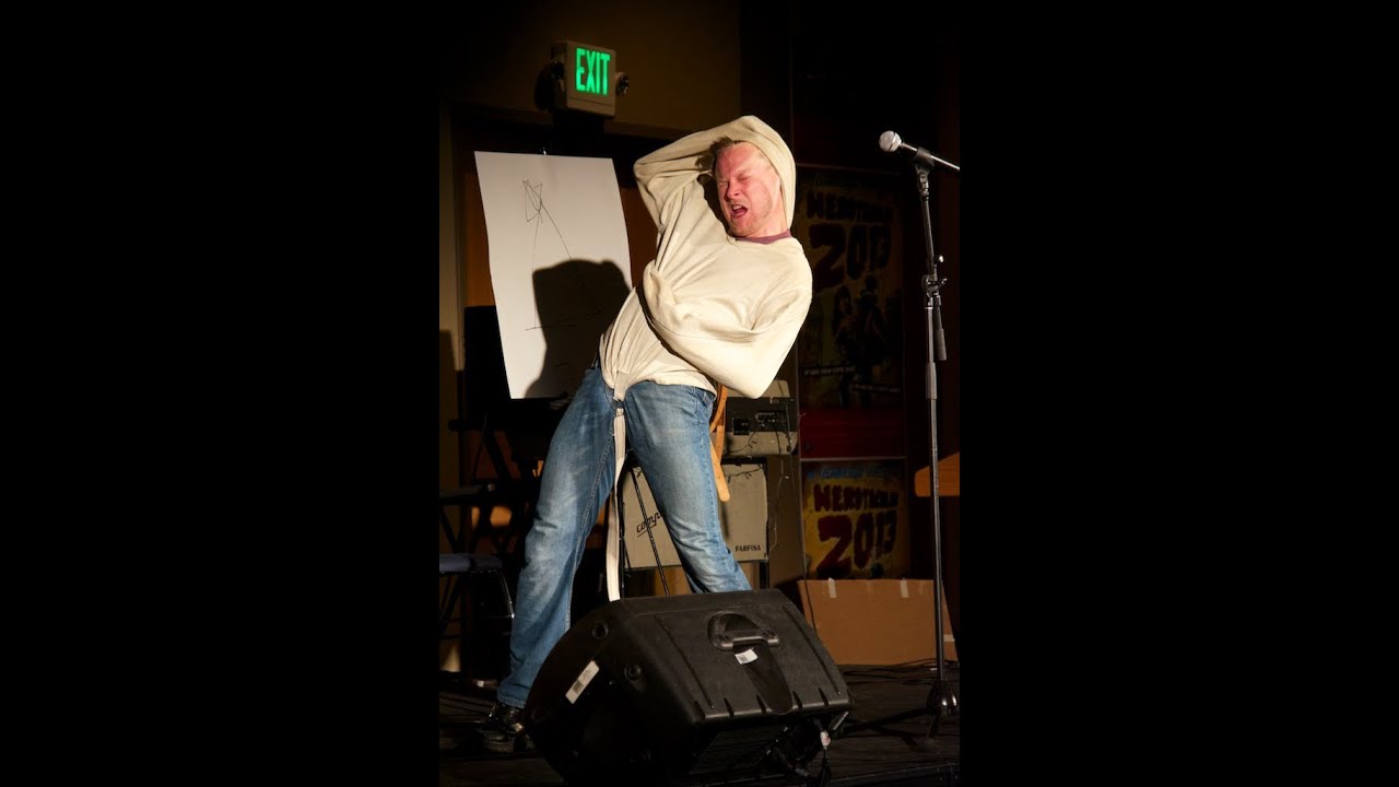 N13: Brian Brushwood - Straight Jacket Escape - YouTube