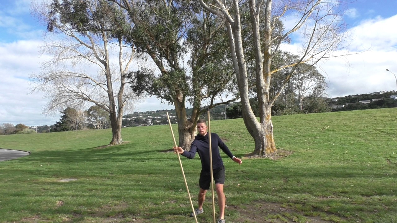 Stick balance two and spin - YouTube