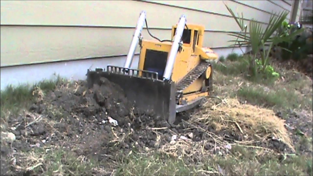 RC Dozer Stripping Grass and Top Soil - YouTube