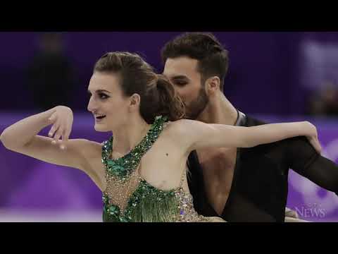 French figure skater powers through wardrobe malfunction