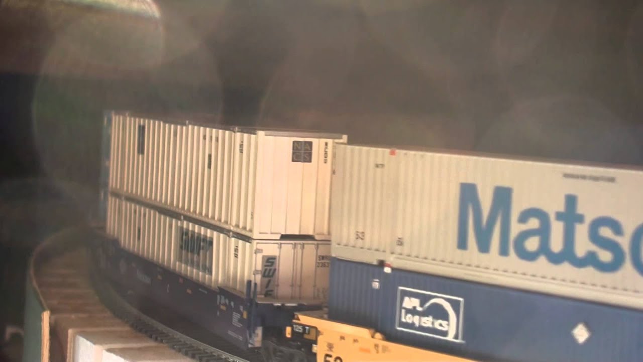 HO UP 6844 and 6843 container train under layout - YouTube