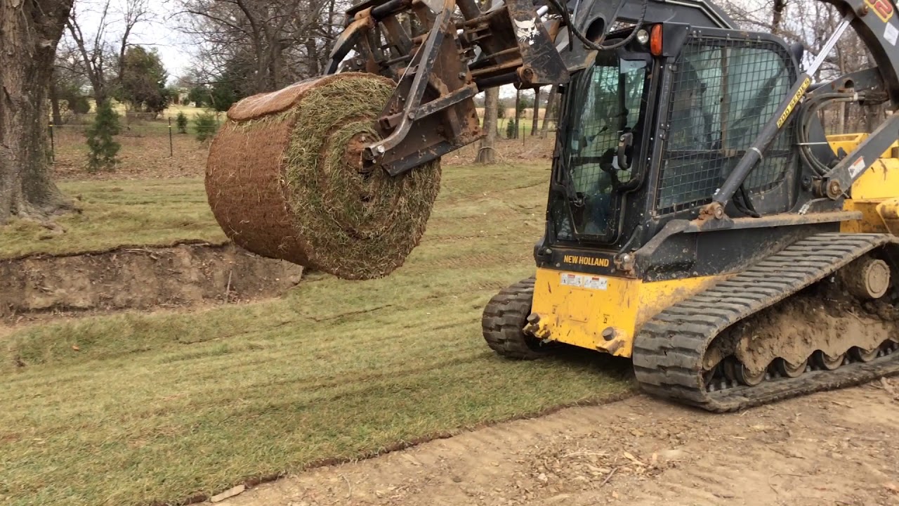 Bobcat Sod Layer with Sod Guide Pro attachment - YouTube