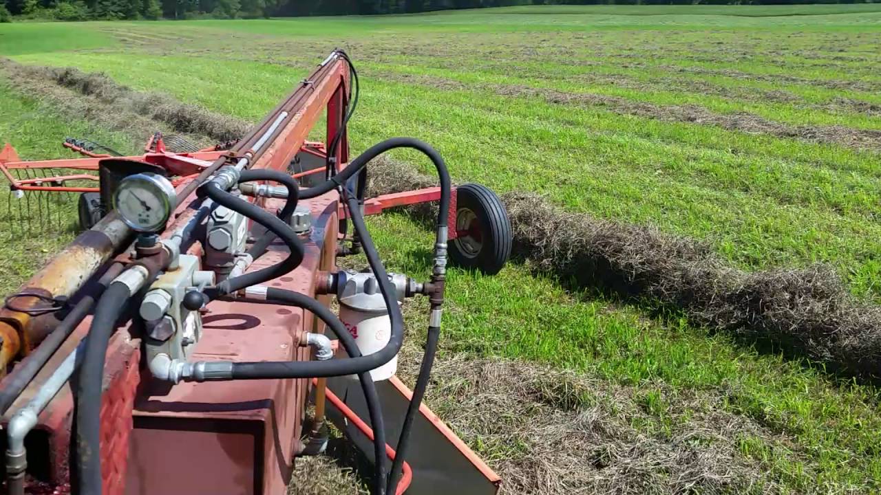 Raking hay - YouTube